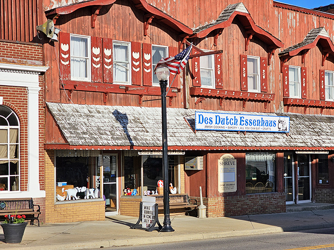 The iconic red exterior of Des Dutch Essenhaus stands proudly in Shreve, its Dutch-inspired architecture promising comfort food treasures within.