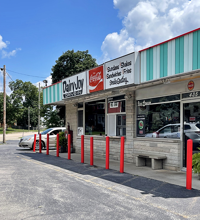 The iconic turquoise-striped awning of Dairy Joy Drive-In stands as a beacon of sweet nostalgia in Hinckley, welcoming ice cream pilgrims since the good old days.