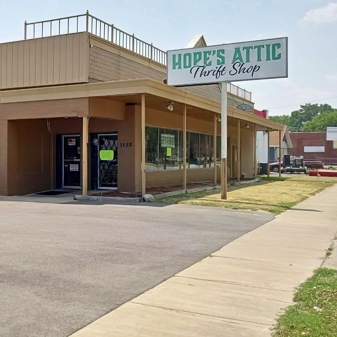 Hope's Attic welcomes treasure hunters with its unassuming exterior and cheerful green signage &ndash; thrifting adventures await inside!