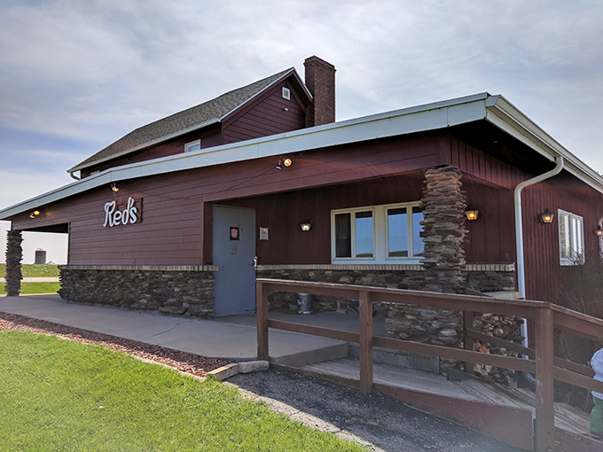 A rustic burgundy haven stands proudly along Highway 80 &ndash; Red's Supper Club beckons with the promise of prime rib perfection.