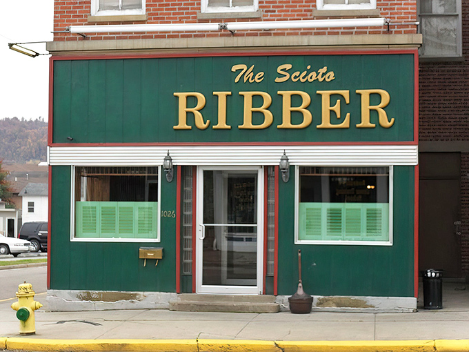 The iconic green storefront of The Scioto Ribber stands proudly on Gallia Street, a beacon for meat lovers throughout the Midwest.