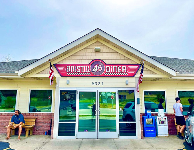 The iconic Bristol 45 Diner sign welcomes hungry travelers with its classic red and chrome styling &ndash; a roadside beacon of comfort food paradise.