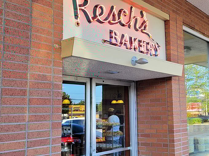 The iconic neon sign beckons sweet-toothed pilgrims to this Columbus institution, promising sugary salvation behind those modest doors.