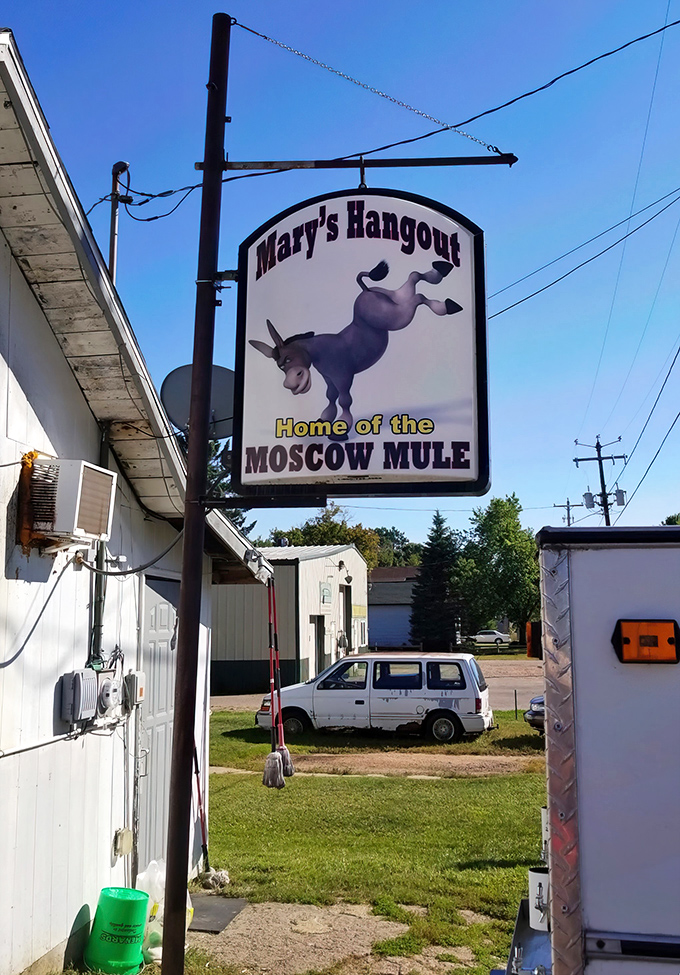 The legendary sign says it all: Mary's Hangout, where the Moscow Mule kicks with attitude and personality.