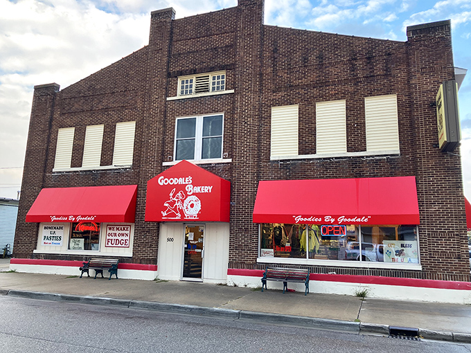 The iconic brick fa&ccedil;ade and bright red awnings of Goodale's Bakery stand as a beacon of sweet nostalgia in downtown Grayling.