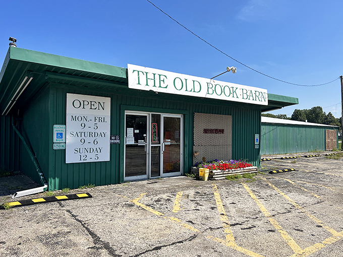 The unassuming green exterior of The Old Book Barn promises literary treasures within, like finding a first edition in your grandma's attic.