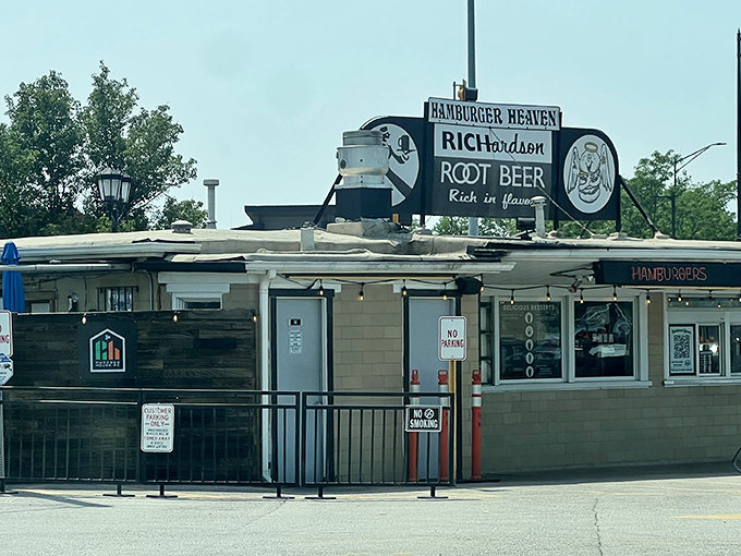 Exterior: The iconic Hamburger Heaven sign beckons hungry travelers with promises of Richardson Root Beer and burger bliss &ndash; a roadside beacon of deliciousness.