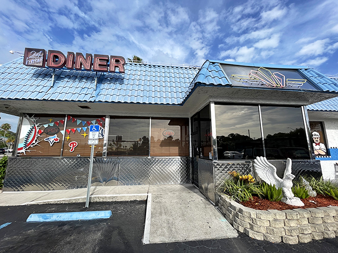The iconic blue roof and classic "DINER" sign promise comfort food salvation 24/7. This isn't just a meal stop&mdash;it's a Florida institution.