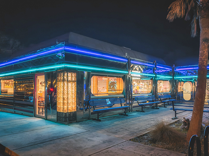 The neon glow of Pink Flamingo Diner transforms nighttime High Springs into a scene straight from "American Graffiti." Those blue lights aren't just illumination&mdash;they're time travel.