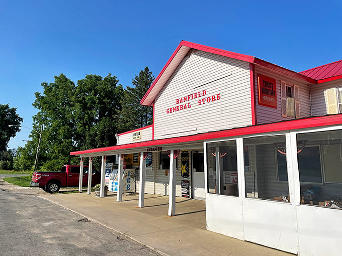 That red roof and unassuming exterior hide some of Michigan's best-kept culinary secrets, proving you can't judge a general store by its cover.