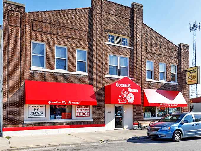 The iconic red awnings of Goodale's Bakery beckon hungry visitors like a culinary lighthouse on Norway Street in Grayling.