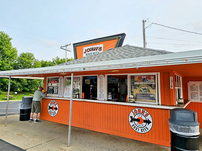 The iconic bright orange exterior of John's Root Beer stands as a beacon of nostalgia in Waukesha, promising frosty mugs and comfort food classics.