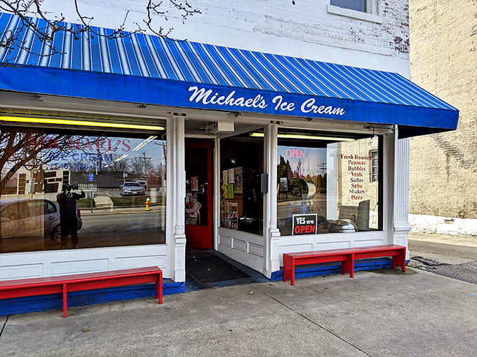 The iconic blue awning of Michael's Ice Cream stands as a beacon of sweetness on Jackson's Main Street, promising nostalgic delights inside.