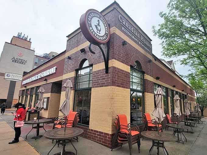 The Canadian Honker's distinctive brick exterior welcomes hungry visitors with its iconic goose logo and inviting entrance, a Rochester landmark worth discovering.