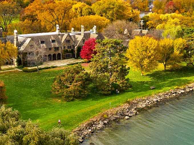 A magnificent Cotswold-inspired mansion nestled among autumn foliage, the Ford House stands as a testament to timeless architectural beauty.