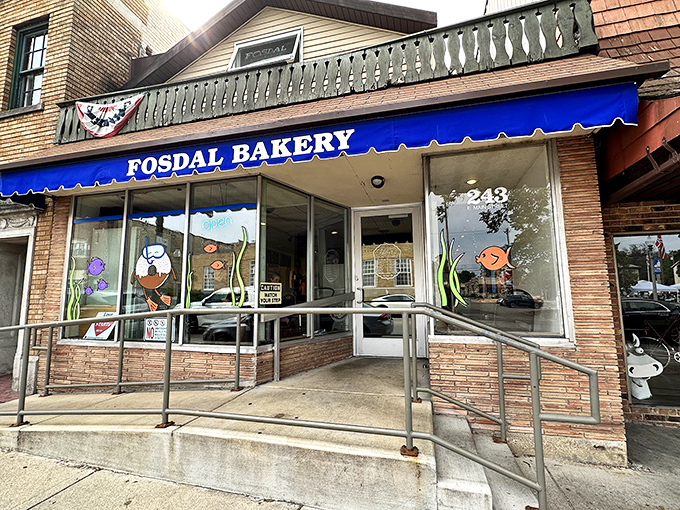 That cheerful blue awning beckons like a beacon of buttery hope on Main Street, promising carbs and happiness in equal measure.