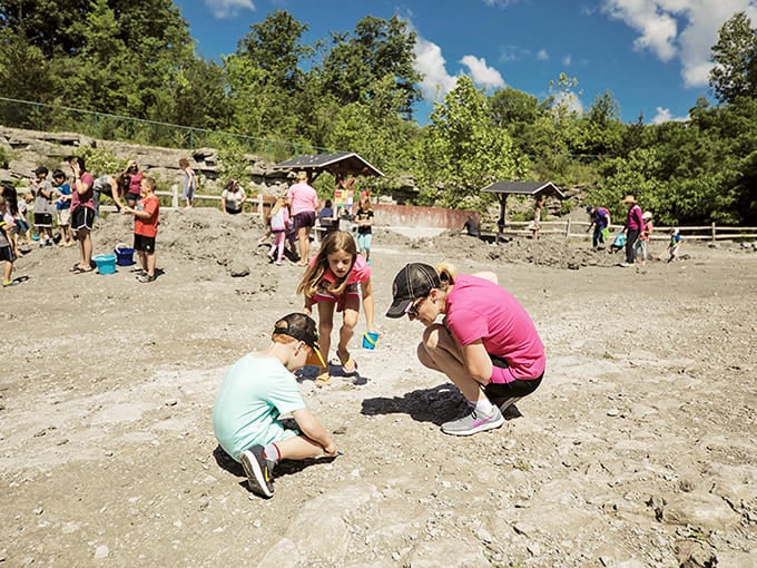 Young explorers crouch low, eyes scanning the ground for treasures that swam when dinosaurs weren't even a twinkle in evolution's eye.