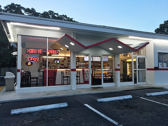 Fray's Donut House stands like a retro time capsule, its vintage sign promising sweet treasures within for early risers and donut enthusiasts alike.