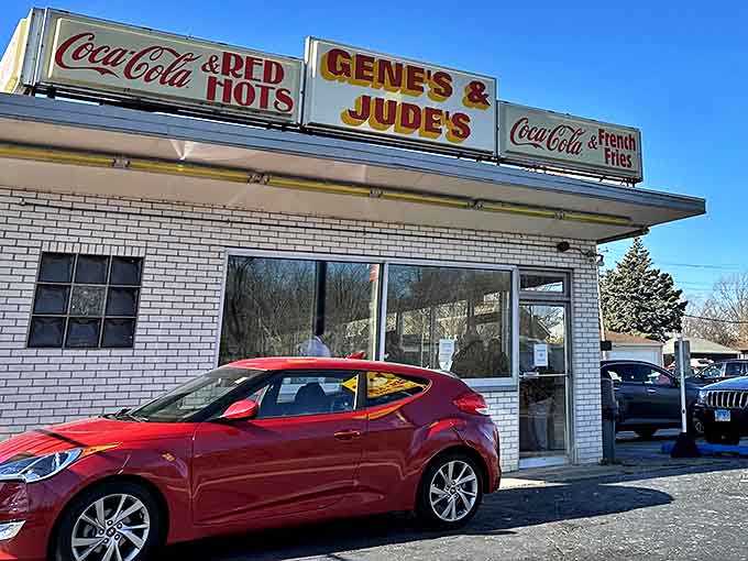 That vintage Coca-Cola signage isn't just decoration, it's a promise that what's inside has been perfected over decades of devoted hot dog craftsmanship.
