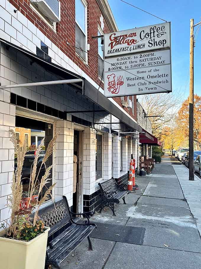 The iconic German Village Coffee Shop sign promises breakfast dreams come true, standing guard over Columbus's most beloved morning ritual.