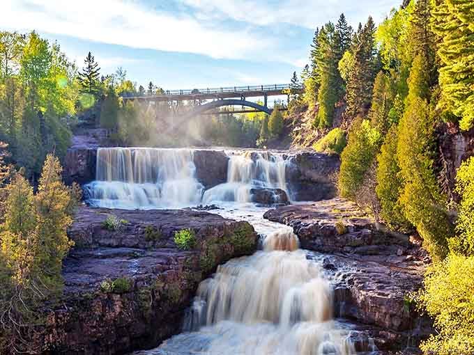 Gooseberry Falls cascades dramatically over ancient volcanic rock, creating nature's own multi-tiered water feature that puts man-made fountains to shame.