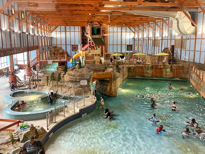 Grand Bear Resort welcomes visitors with rustic elegance, where timber beams and stone pillars promise wilderness luxury just steps from Starved Rock's natural wonders.