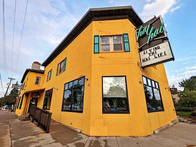 The sunshine-yellow exterior of Hai Hai stands out like a tropical beacon in Northeast Minneapolis, promising exotic flavors within its vibrant walls.