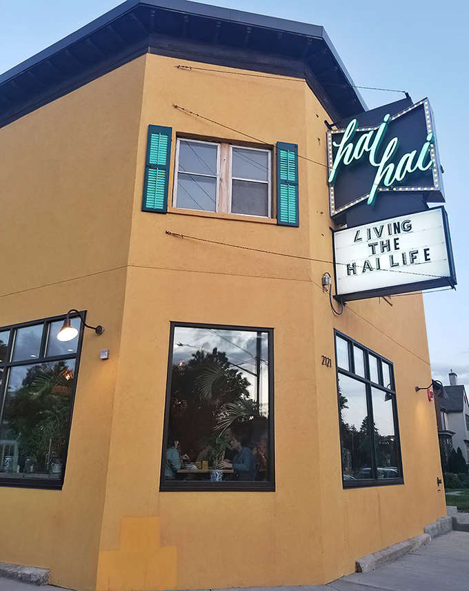 Hai Hai's sunshine-yellow exterior with turquoise shutters stands out like a tropical postcard in Minneapolis, promising exotic flavors within those vibrant walls.