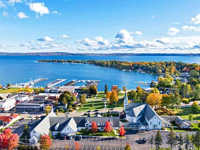 Harbor Springs unfolds like a watercolor painting come to life, where azure waters meet historic charm and every view feels frameable.