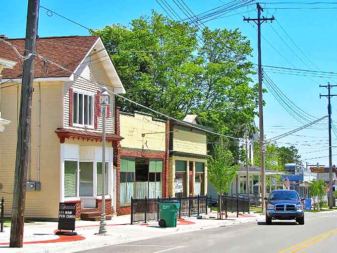 Harrisville's charming main street whispers of simpler times, where storefronts maintain their historic character while welcoming modern explorers.