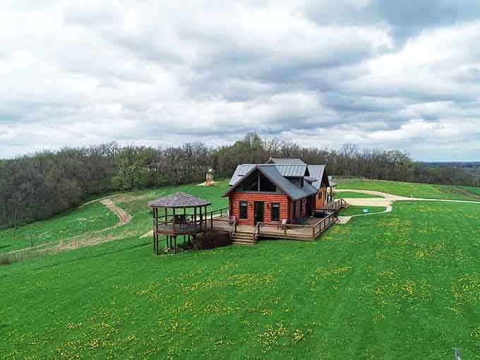 A rustic log cabin crowning a verdant hilltop &ndash; Highview Country Escape stands like a sentinel overlooking miles of Wisconsin's rolling countryside.