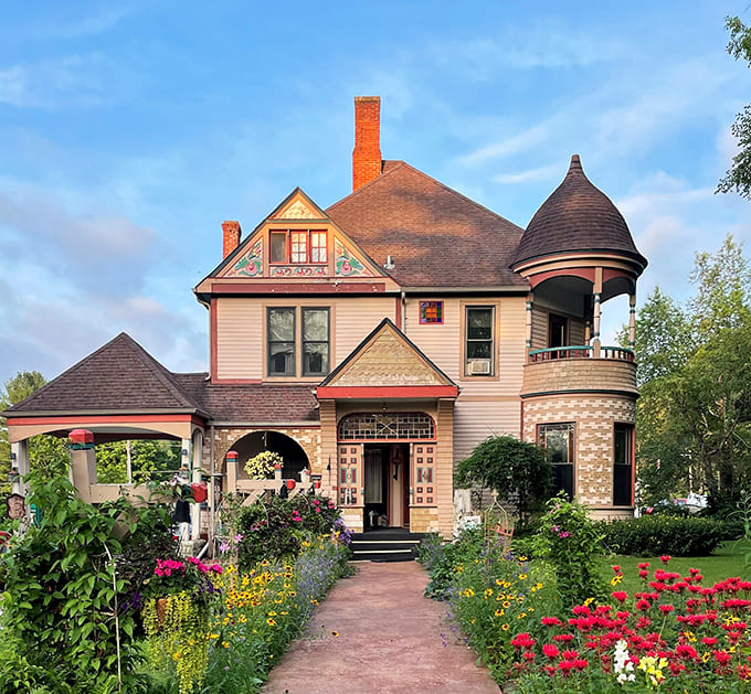 The Historic Scanlan House stands proudly in Lanesboro, its Victorian charm and turret beckoning visitors like a time machine disguised as architecture.