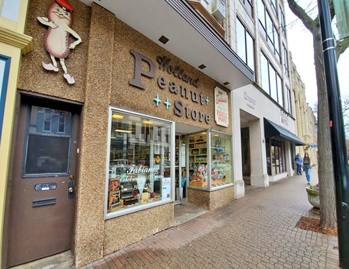 The iconic storefront of Holland Peanut Store beckons with its vintage charm and that mischievous peanut mascot watching over downtown Holland.