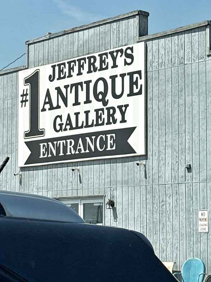 The unassuming exterior of Jeffrey's Antique Gallery belies the treasure trove within, like finding a portal to the past disguised as a country barn.