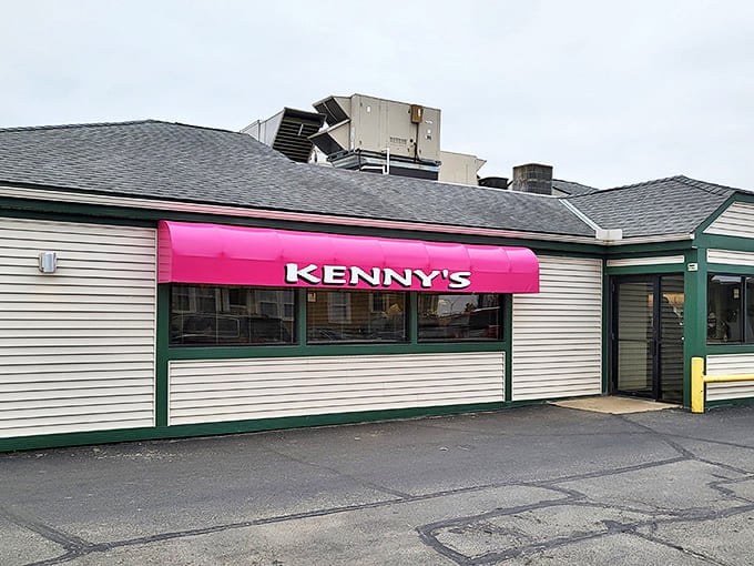 Kenny's pink awning stands out like a beacon of comfort food hope, promising nostalgic delights within those humble walls.