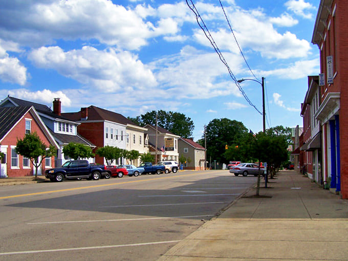 Kingston's Main Street whispers stories of simpler times, where brick buildings stand proudly against the backdrop of Ohio's blue skies.