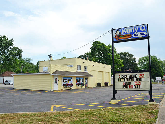That cheerful yellow exterior isn't just a building, it's a beacon of happiness visible from down the street, calling ice cream lovers home.