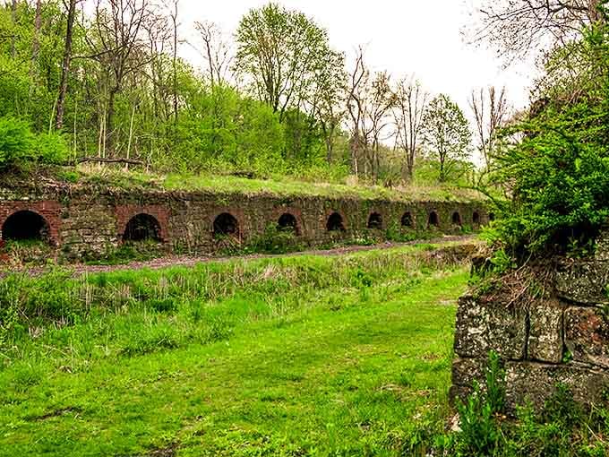 Nature's reclamation project: Moss-covered brick arches line this historic waterway, creating a scene straight from a fantasy novel.
