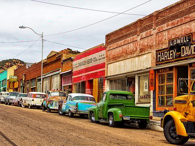 Erie Street's time capsule &ndash; vintage cars line up against brick storefronts, waiting for drivers who stepped away decades ago.