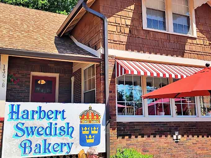 That charming red-and-white striped awning isn't just for show; it's your first hint that something special awaits inside this unassuming Harbor Country treasure.