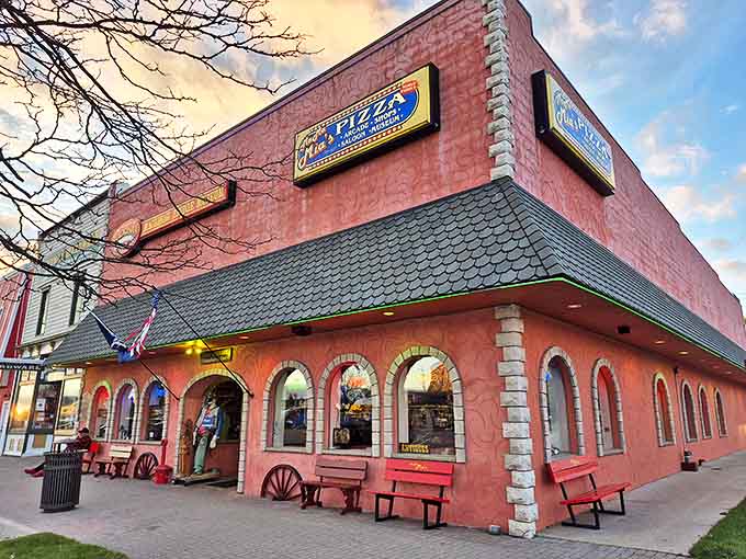 The eye-catching coral-pink exterior of Mama Mia's Pizza houses not one but two Mackinaw City treasures &ndash; delicious Italian fare and fascinating bridge history.