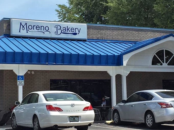 That distinctive blue roof isn't just for show, it's a beacon guiding hungry souls to some of the best Cuban sandwiches in Florida.
