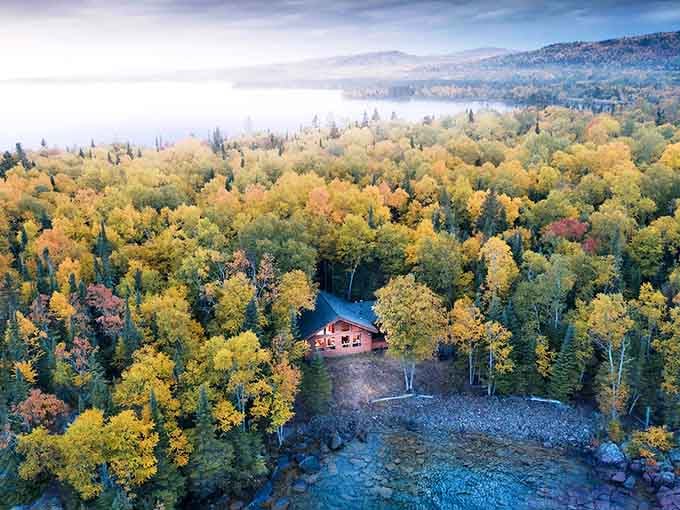 A bird's-eye view of paradise &ndash; this rustic cabin nestled among autumn-painted trees looks like Mother Nature's favorite hideaway.