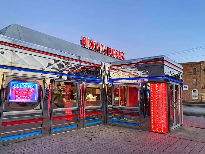 The gleaming chrome exterior of Nicky D's Burgerz lights up Port Huron like a time machine disguised as a diner. Pure Americana on display!