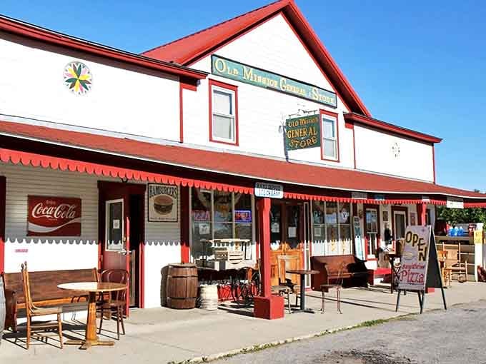 The white clapboard building with its distinctive red roof stands like a time traveler from another century, inviting modern visitors to step back in time.