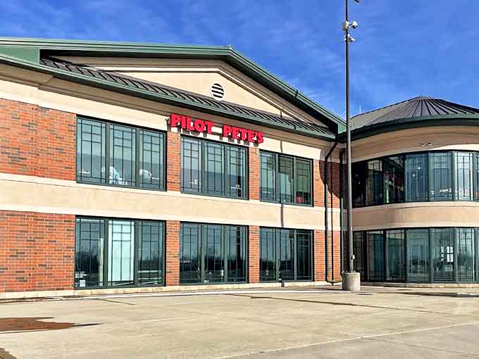 Pilot Pete's exterior welcomes hungry travelers with its brick facade and distinctive signage, promising aviation thrills and culinary delights inside.