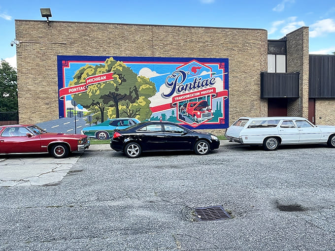That vibrant mural outside isn't just decoration&mdash;it's a love letter to Michigan's automotive soul painted right on the building.