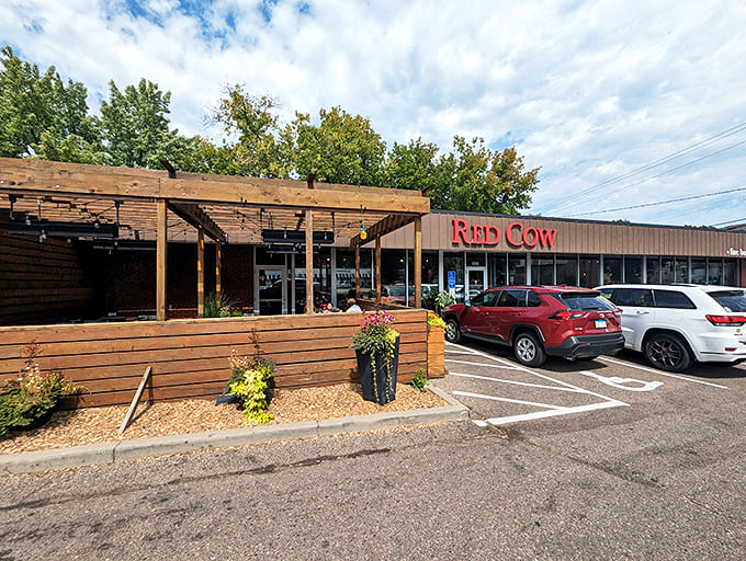 Red Cow's welcoming exterior blends modern design with rustic charm, promising culinary delights behind those glass doors.