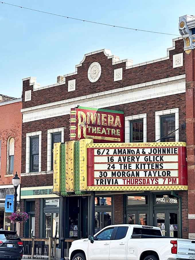The iconic Riviera Theatre marquee lights up North Main Street in Three Rivers, promising entertainment and culinary delights within those historic brick walls.