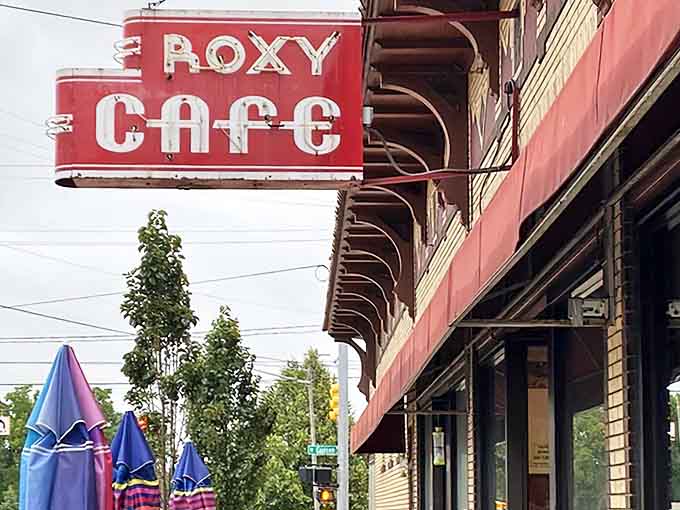 The iconic red Roxy Caf&eacute; sign beckons hungry travelers like a breakfast lighthouse guiding ships to the shores of deliciousness.